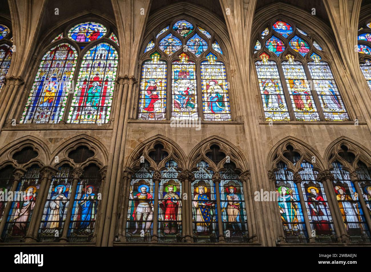 Beautiful stained glass windows with colorful biblical scenes, inside a ...