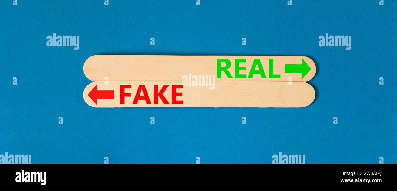 Real or fake symbol. Concept word Real or Fake on beautiful wooden ...