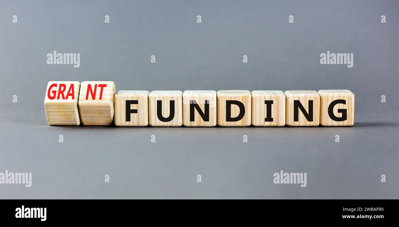Grant funding symbol. Concept words Grant funding on beautiful wooden ...