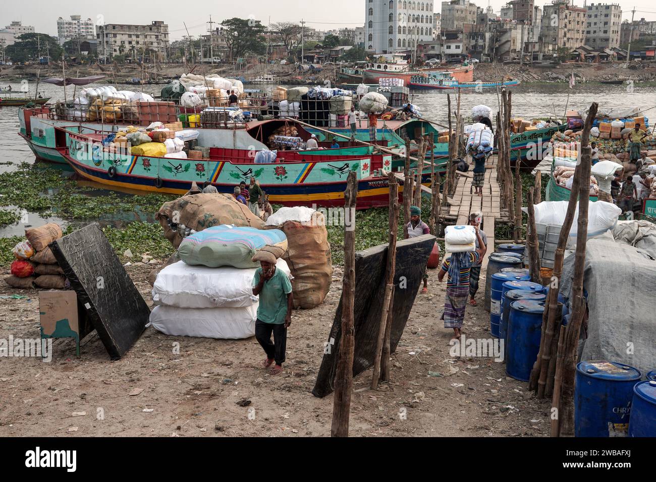 Ships and boats on the Buriganga River in Dhaka, Bangladesh are loaded ... Ships and boats on the Buriganga River in Dhaka, Bangladesh are loaded ...