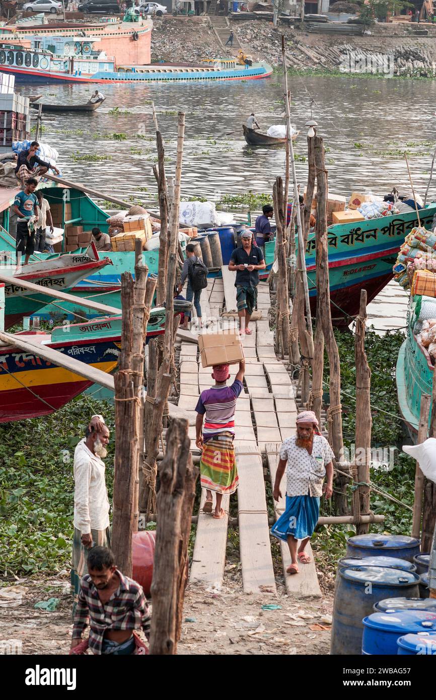 Ships and boats on the Buriganga River in Dhaka, Bangladesh are loaded ... Ships and boats on the Buriganga River in Dhaka, Bangladesh are loaded ...