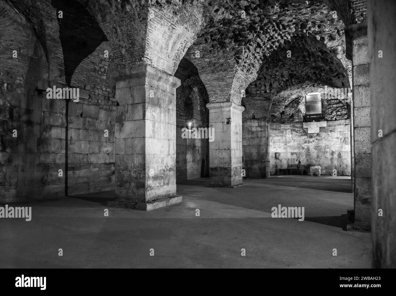 Old stone ruins inside. Stone halls and rooms of an old palace or ...