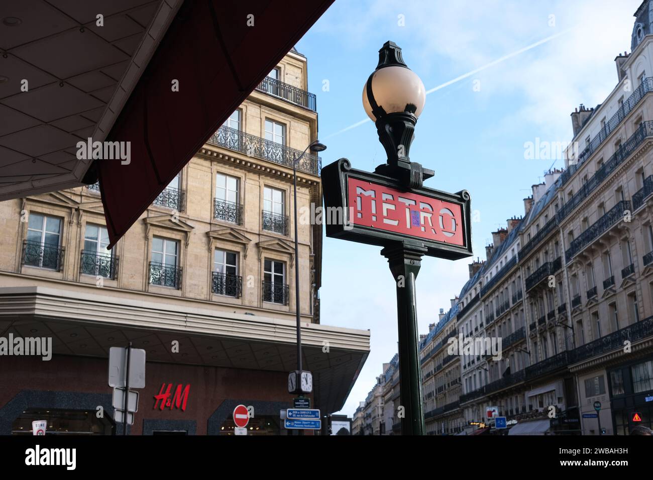 Paris, France - January 1, 2024: Pole with the symbol of the metropolitan train, the Paris metro ...