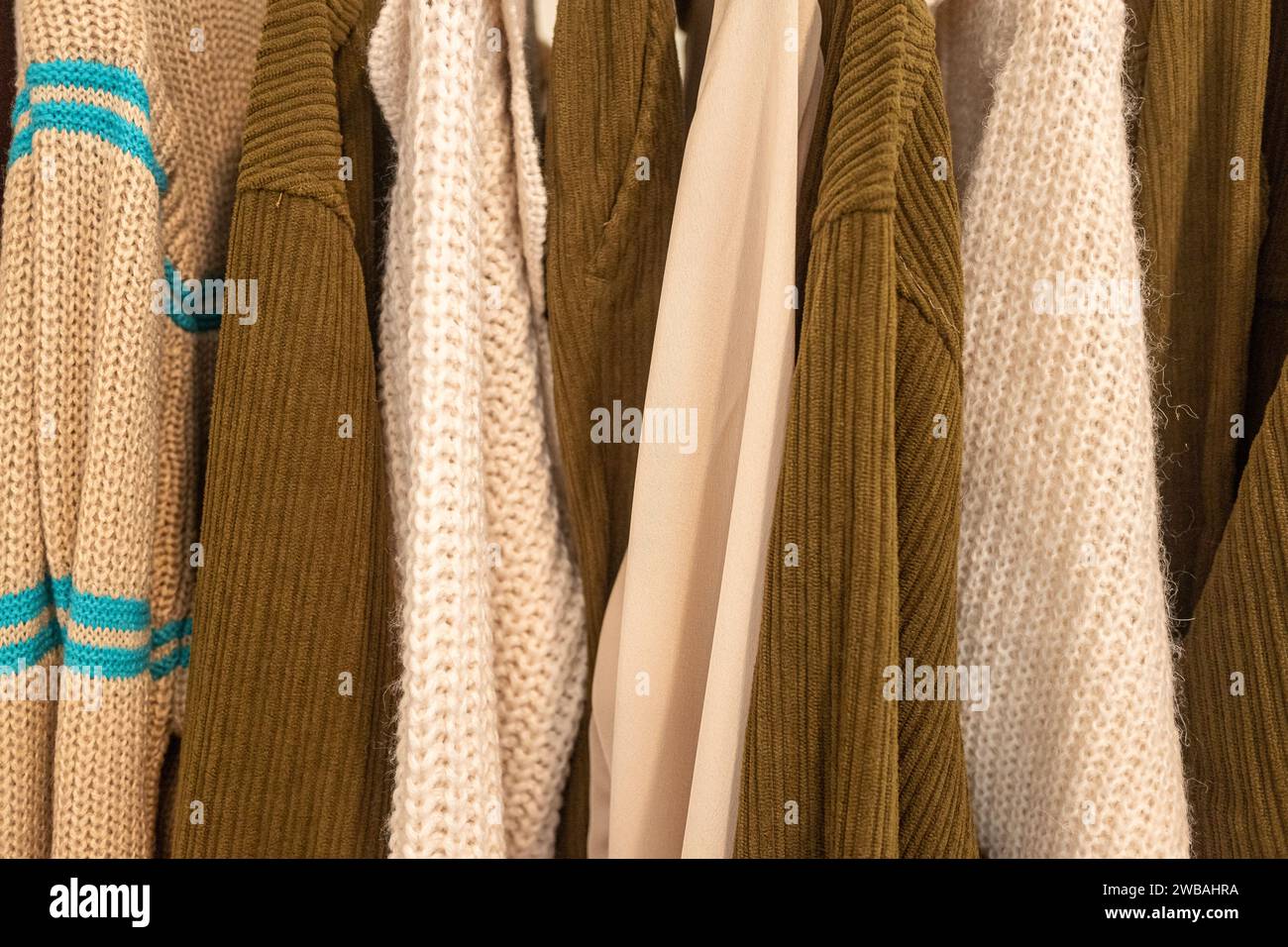 Knitwear on a clothing rack hi-res stock photography and images - Alamy
