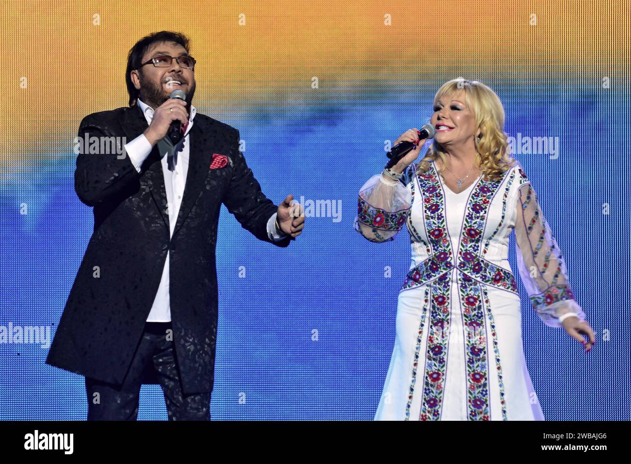Singers Vitaliy and Svitlana Bilonozhko perform during the song ...