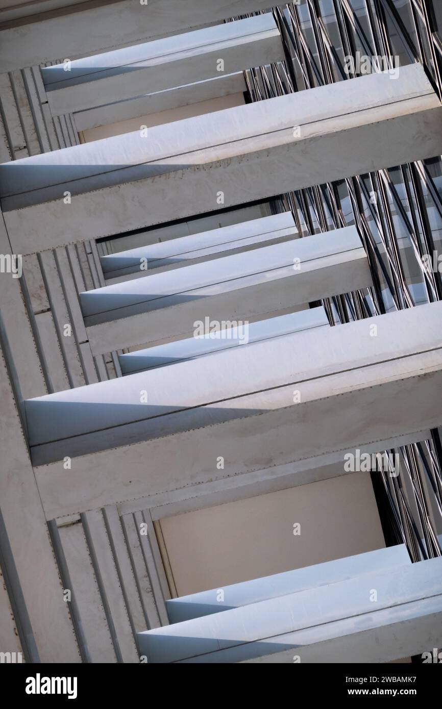 Diagonal view of a modern high-rise with intersecting lines and ...