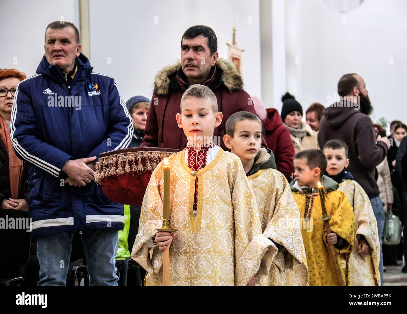 KYIV, UKRAINE - JANUARY 6, 2024 - Altar boys are pictured during the ...