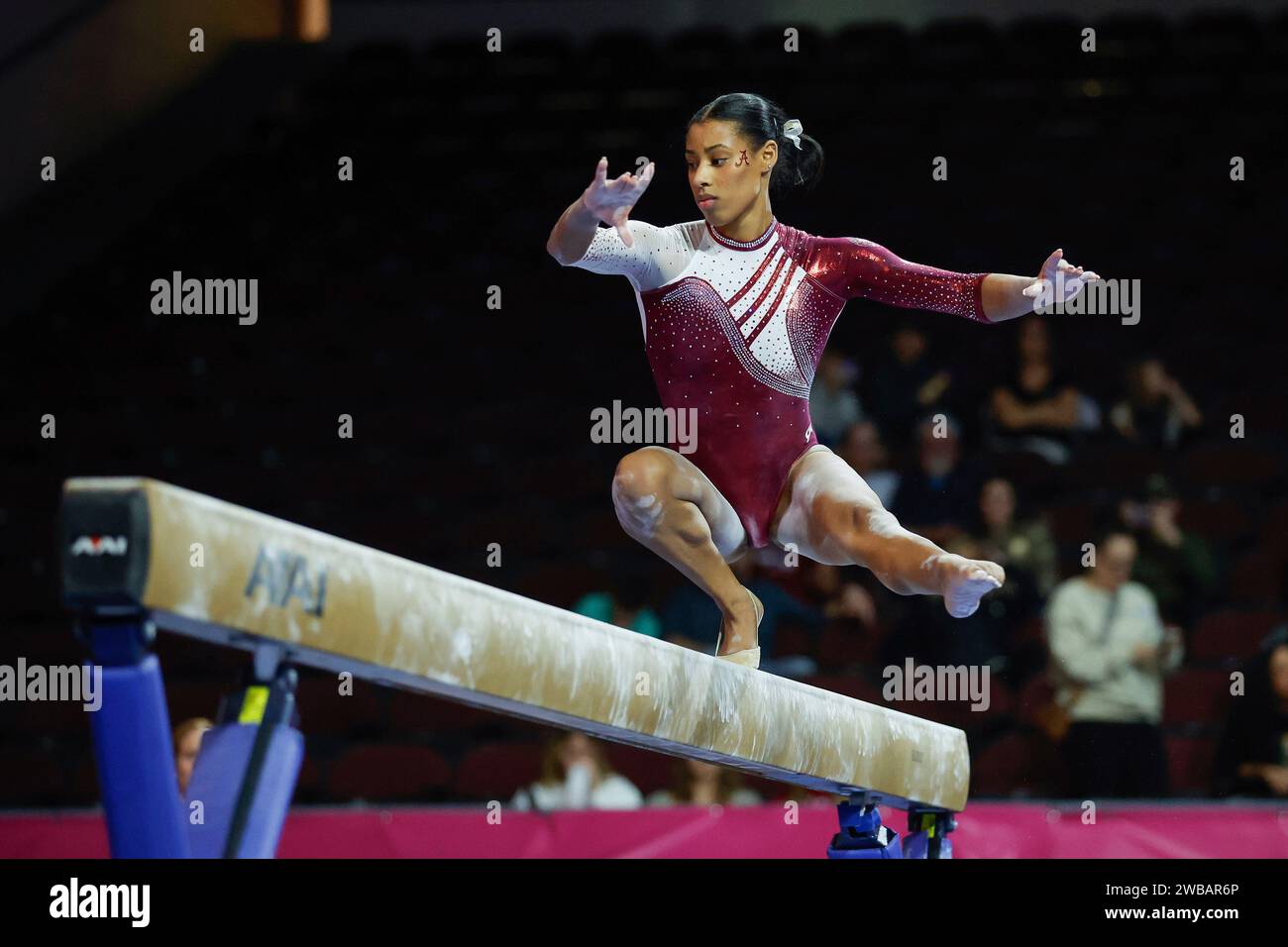 Alabama's Shania Adams competes on the balance beam during an NCAA ...