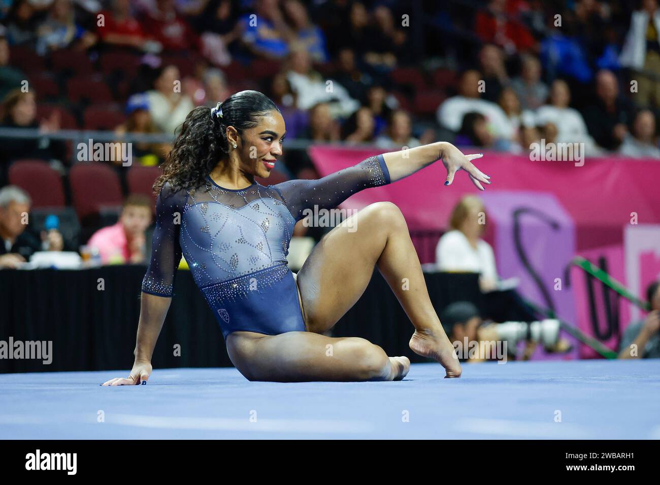 California's eMjae Frazier competes on the floor exercise during an ...