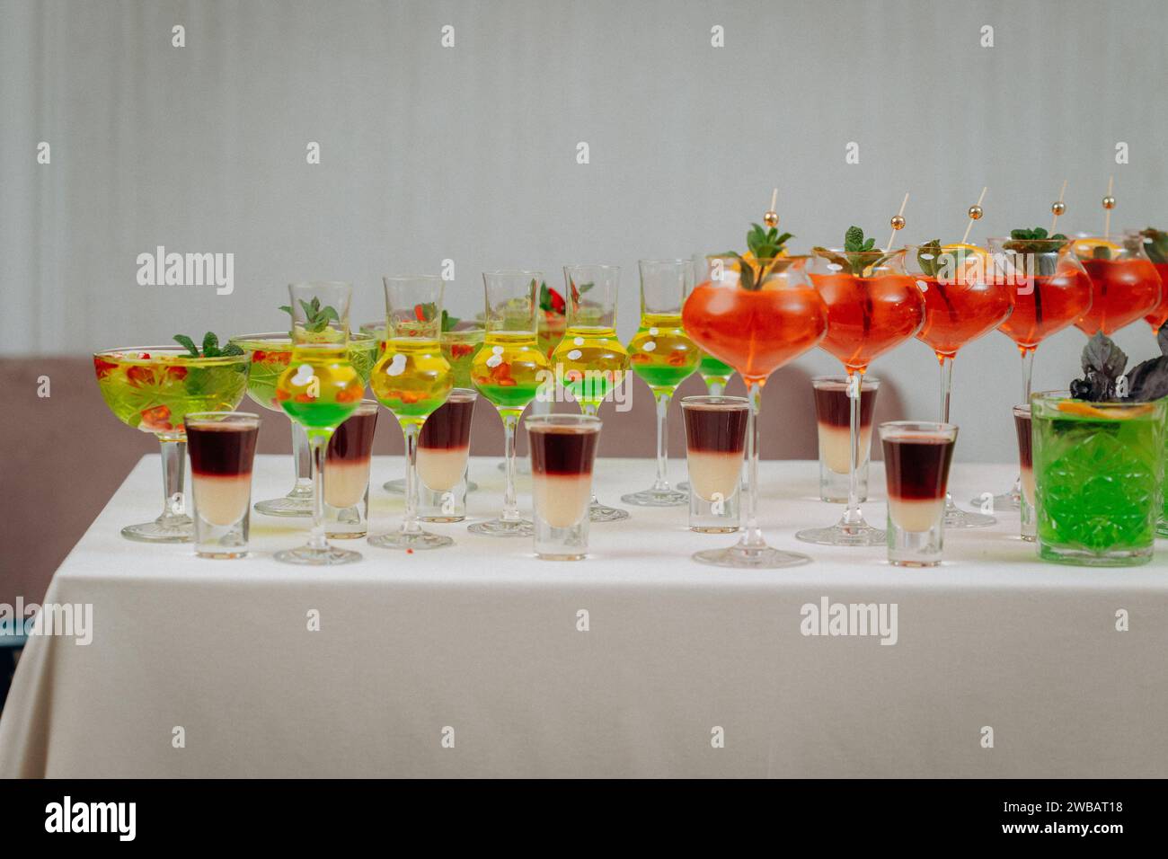 Welcome drink with cocktail glasses and drinks at an event. Alcoholic ...