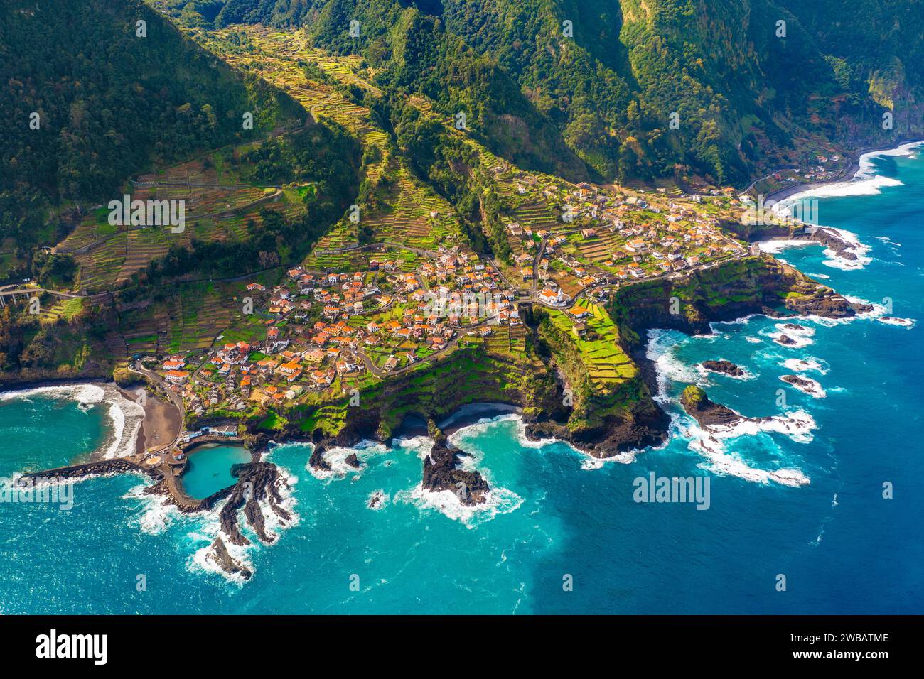 Aerial view of Madeira island. Land meets ocean in Seixal, Madeira ...