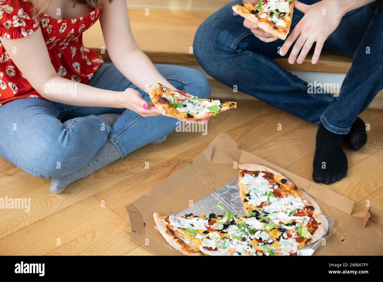 Ordering pizza with delivery during a social gathering Stock Photo - Alamy