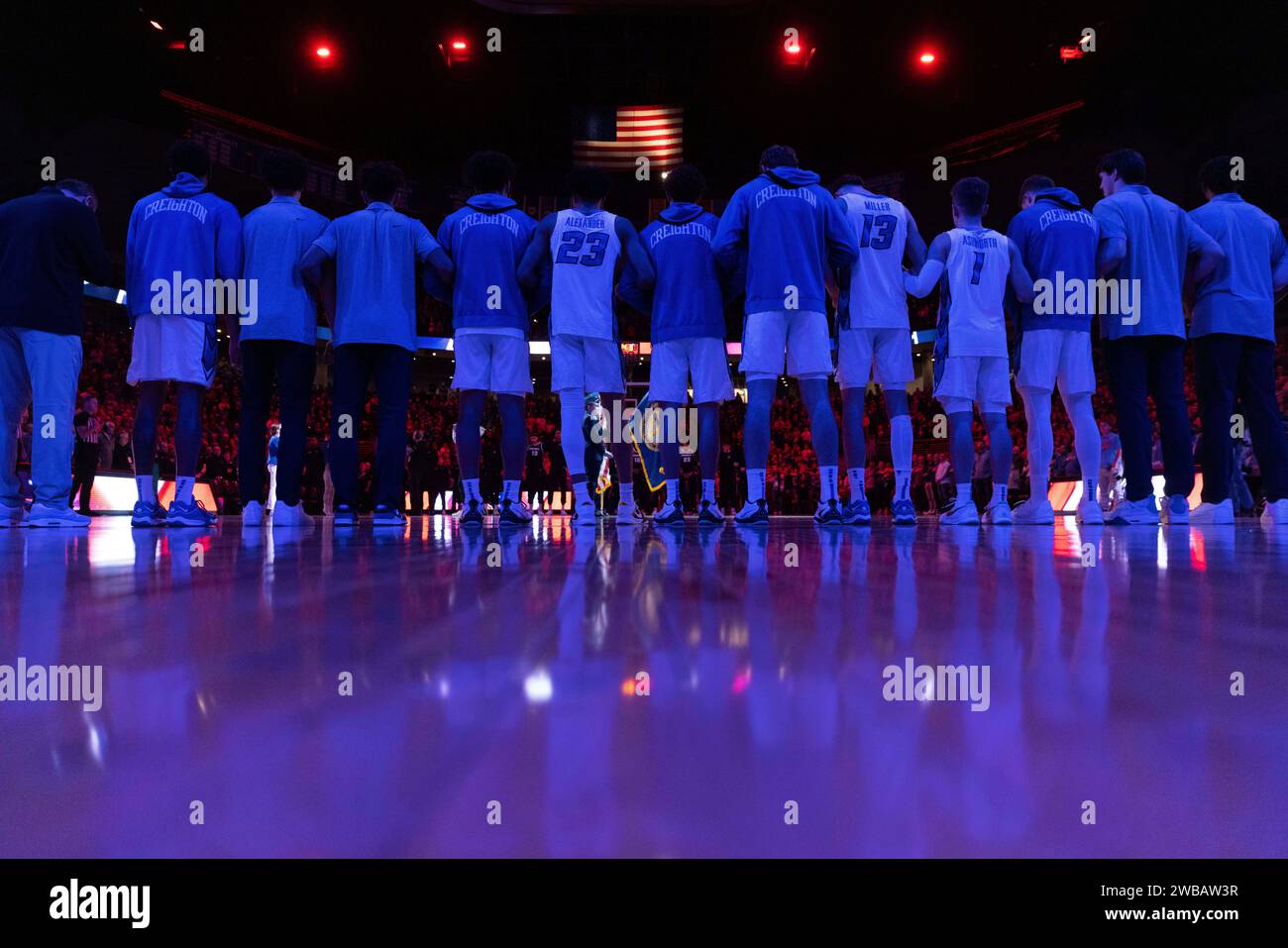 Creighton players and coaches line up for the singing of the national ...