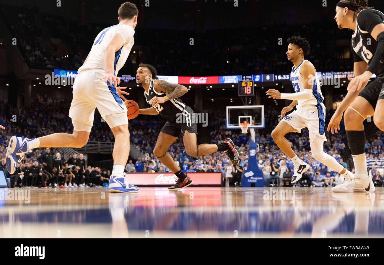 Providence's Devin Carter (22) plays against Creighton's Ryan ...