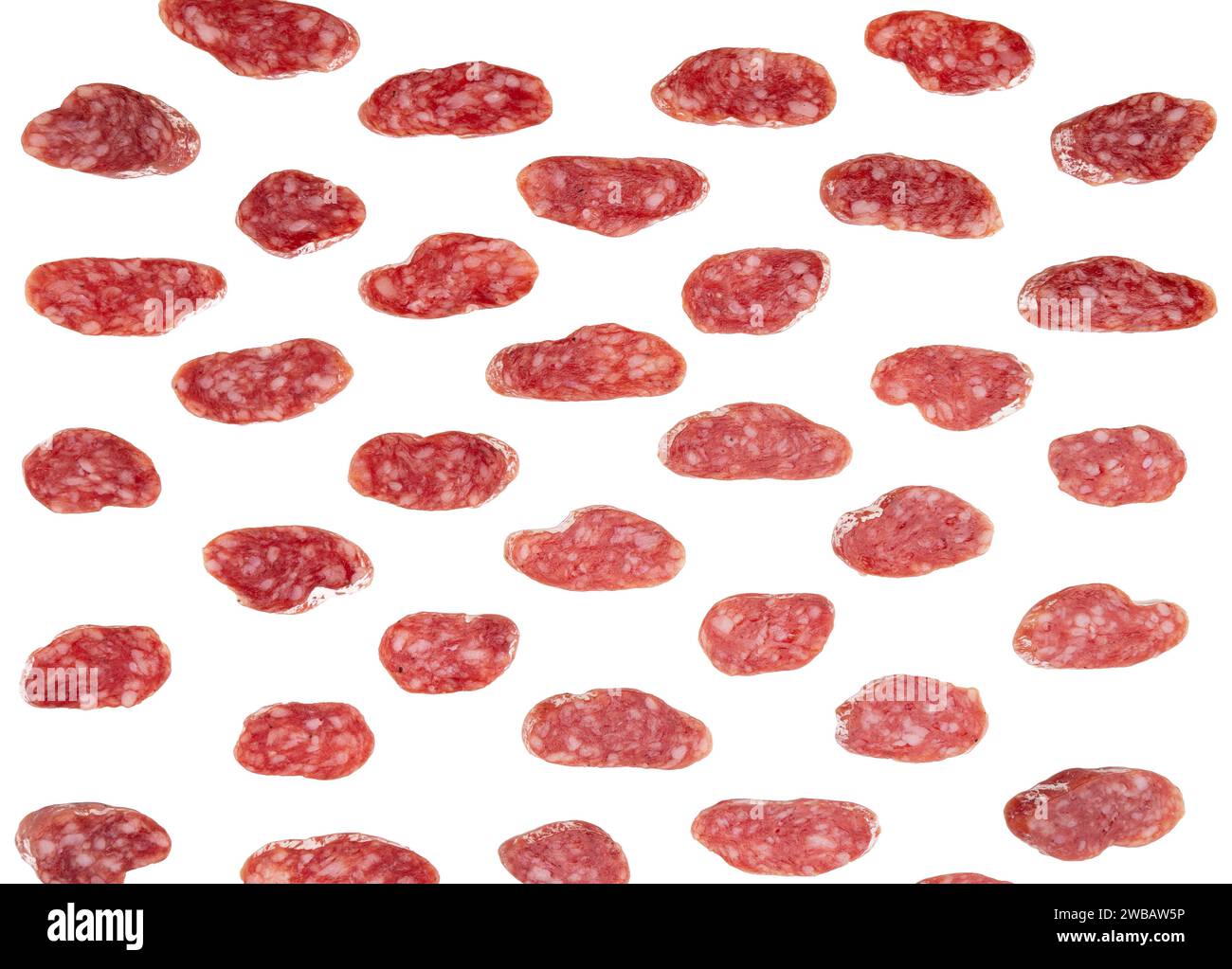 slices of salami isolated on white background with clipping path, concept of pattern with tasty ...