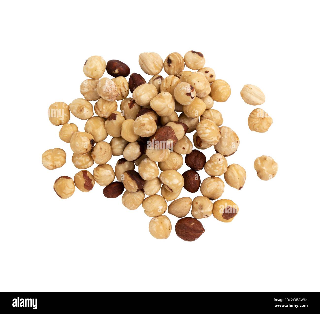 heap of roasted peeled and unpeeled hazelnuts isolated on white ...