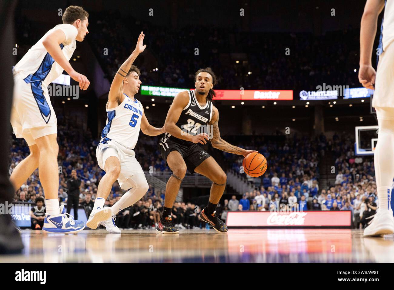 Providence's Devin Carter, right, plays against Creighton's Ryan ...