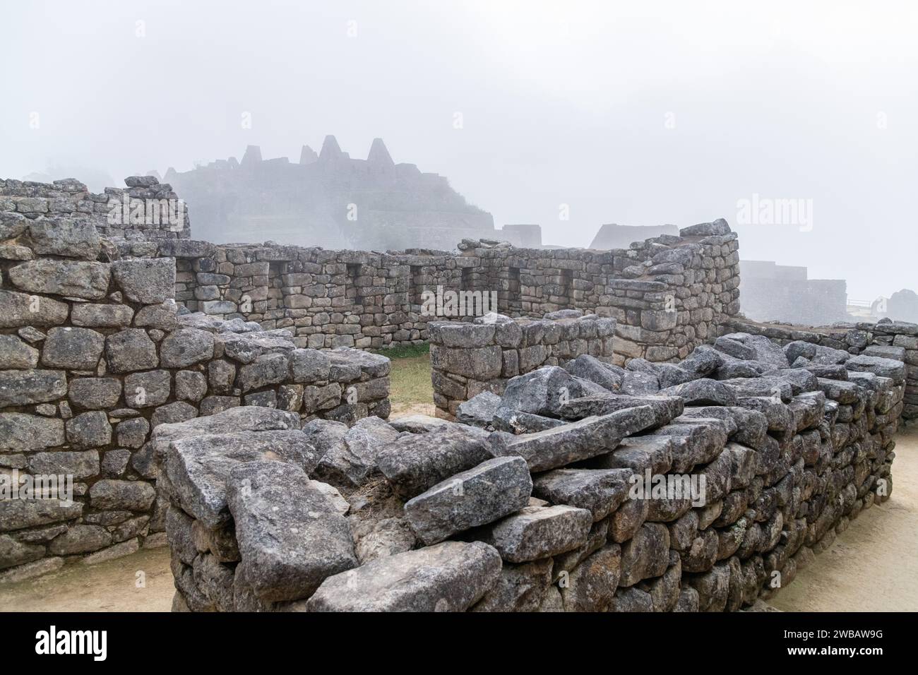 Empty granite stone building structures at Machu Picchu in Peru Stock ...