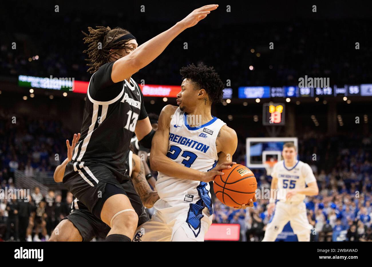Providence's Josh Oduro (13) defends against Creighton's Trey Alexander ...