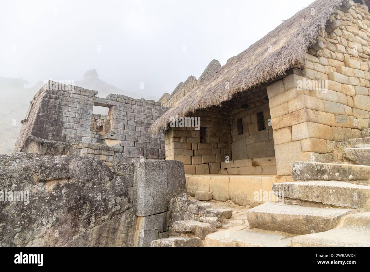 Empty granite stone building structures at Machu Picchu in Peru Stock ...