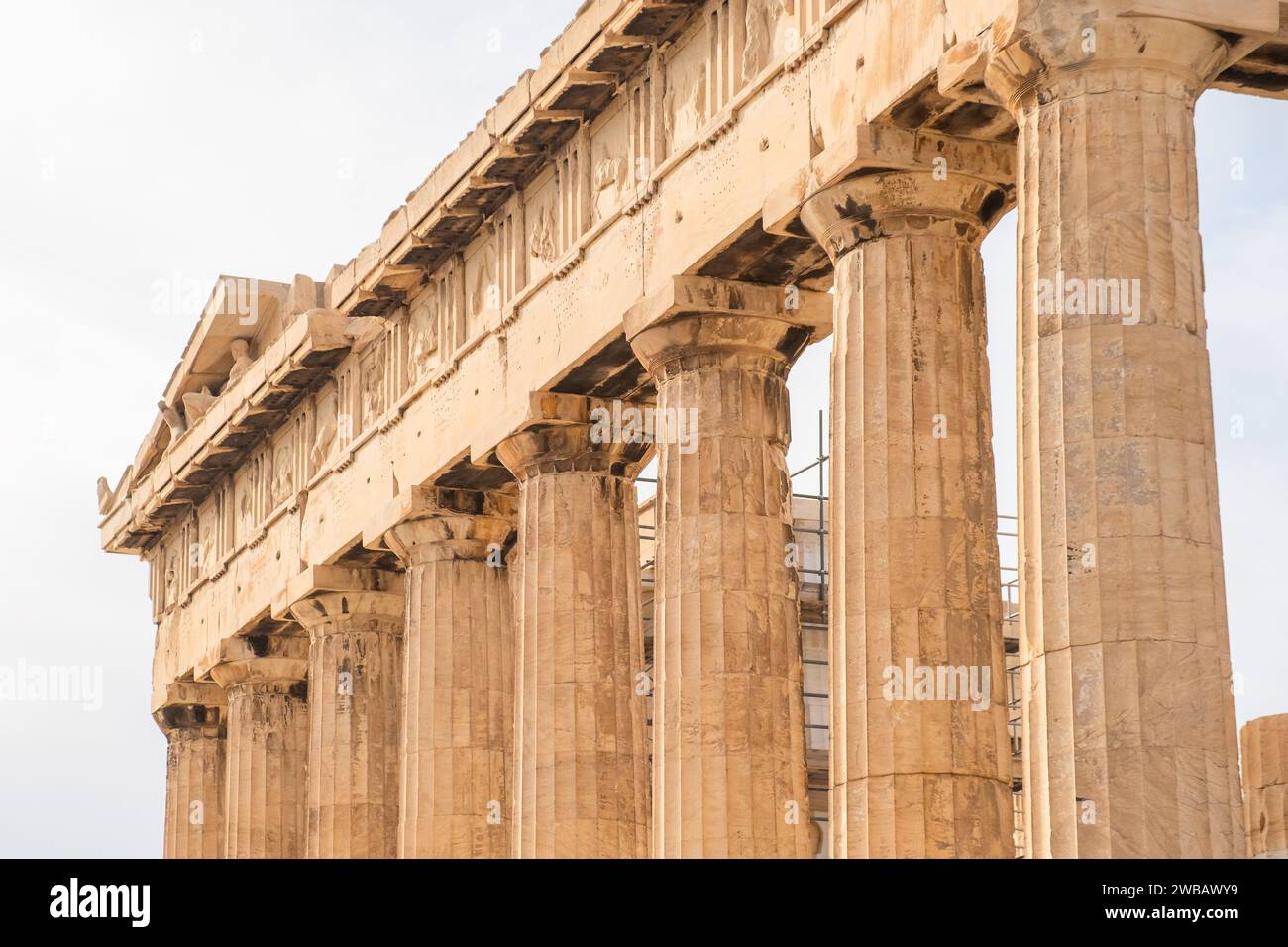 Colonnade with marble ancient columns of Parthenon temple on the Acropolis in Athens, Greece ...