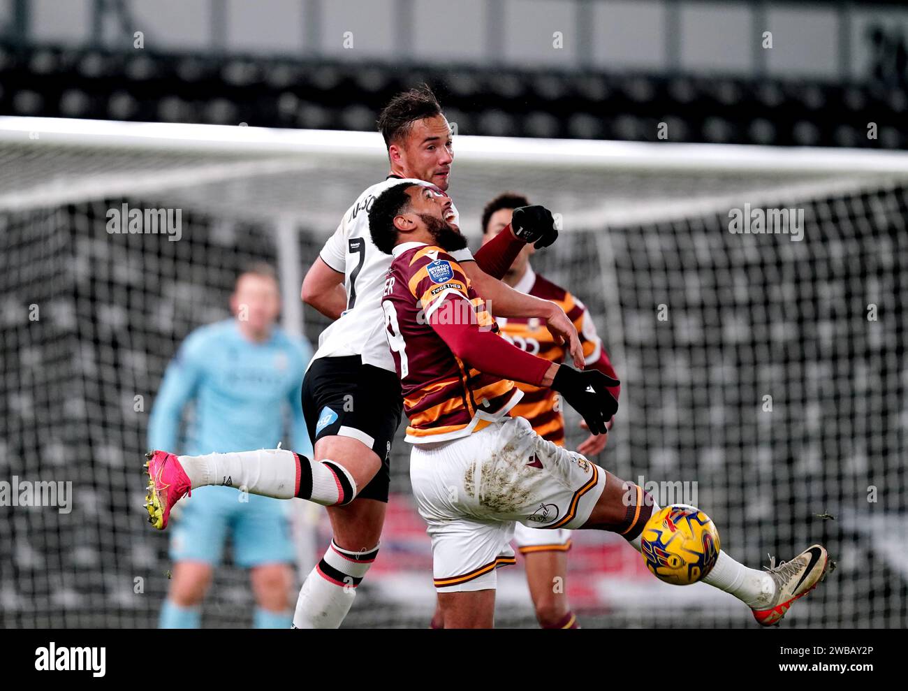 Derby County's Kane Wilson (left) and Bradford City's Vadaine Oliver ...