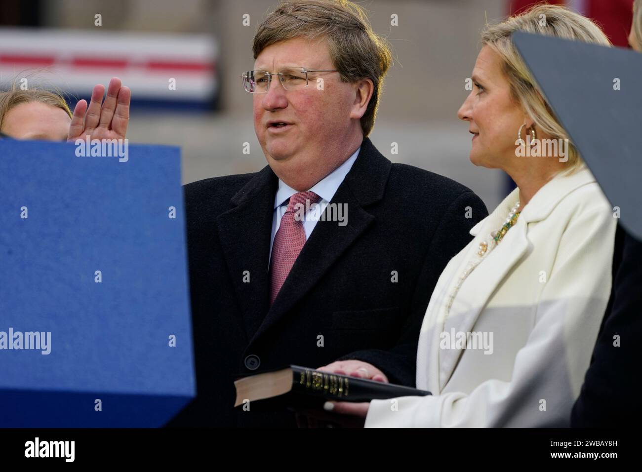 Mississippi Republican Gov. Tate Reeves recites the oath of office as ...