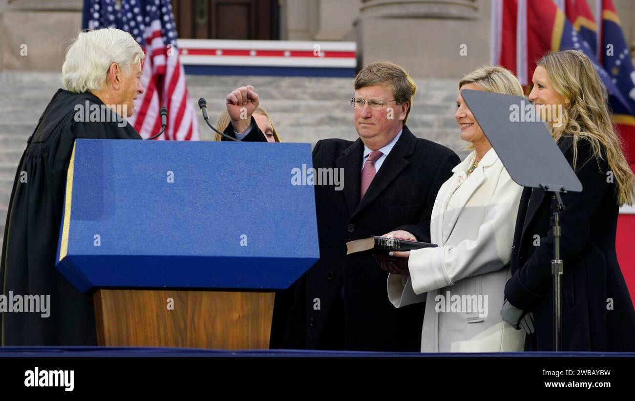 Mississippi Republican Gov. Tate Reeves recites the oath of office as ...