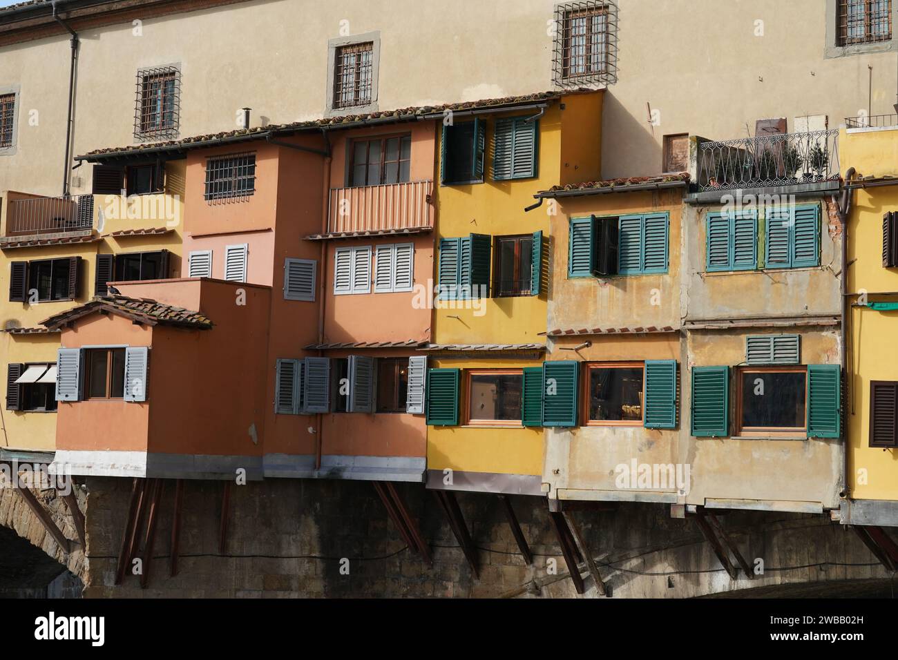 Ponte Vecchio bridge with shops and buildings on the bridge in Florence ...