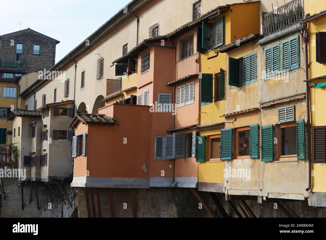 Ponte Vecchio bridge with shops and buildings on the bridge in Florence ...