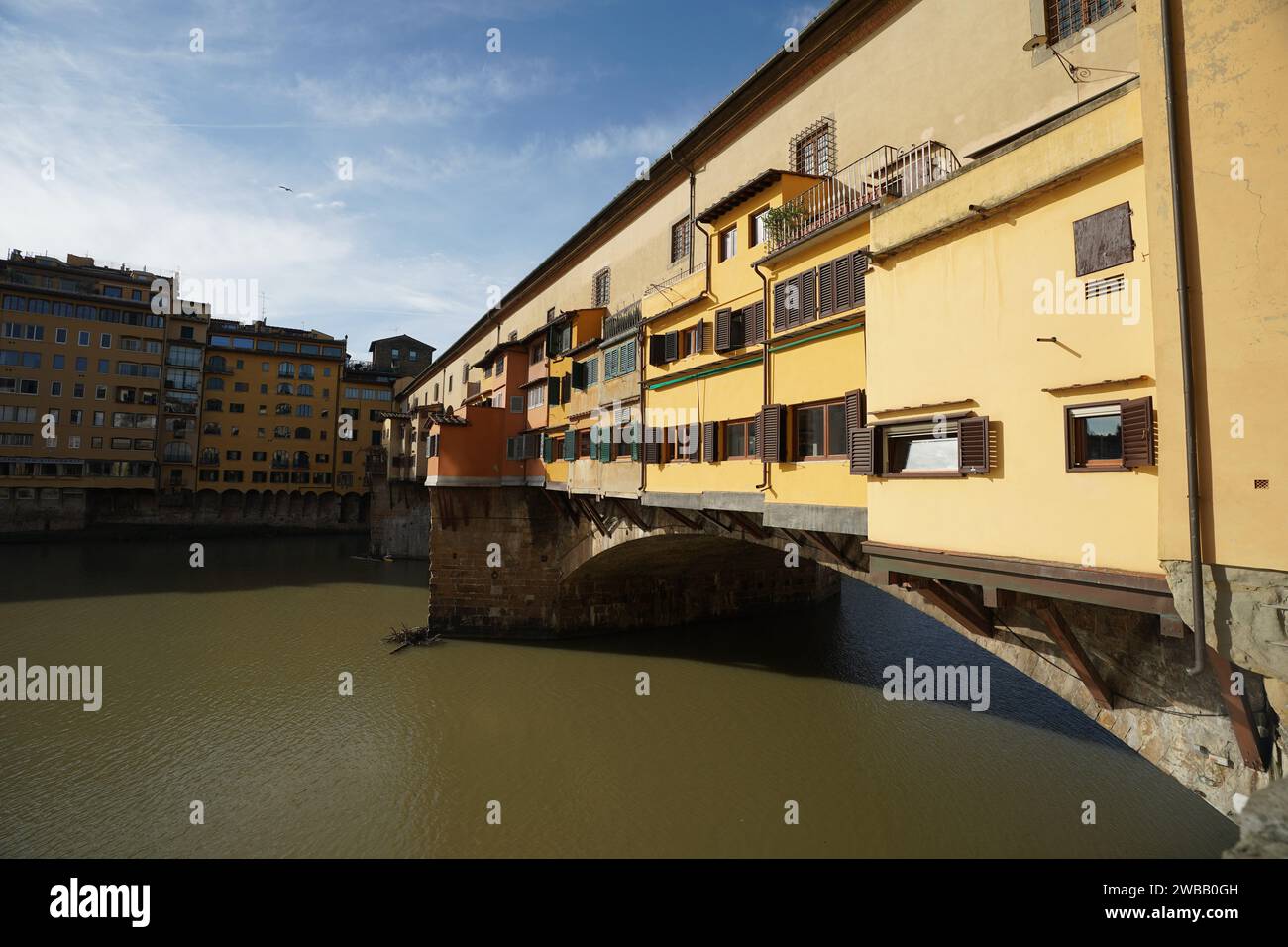 Ponte Vecchio bridge with shops and buildings on the bridge in Florence ...