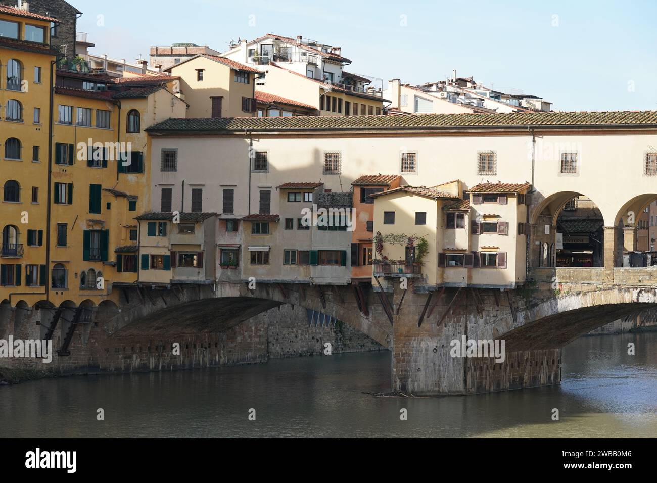 Ponte Vecchio bridge with shops and buildings on the bridge in Florence ...