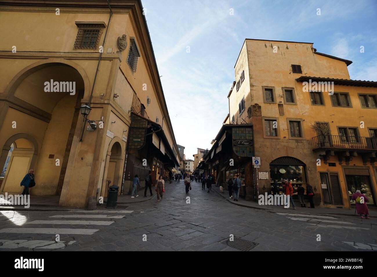 Ponte Vecchio bridge with shops and buildings on the bridge in Florence ...