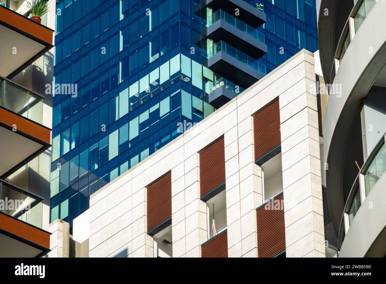 Contrasting architecture with an old building flanked by modern glass ...