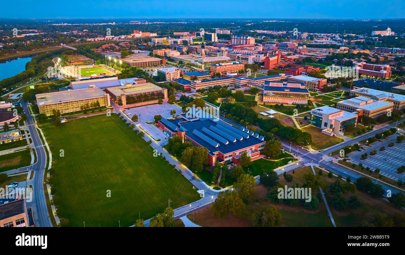 Aerial Twilight View of University Campus with Green Spaces and Modern ...