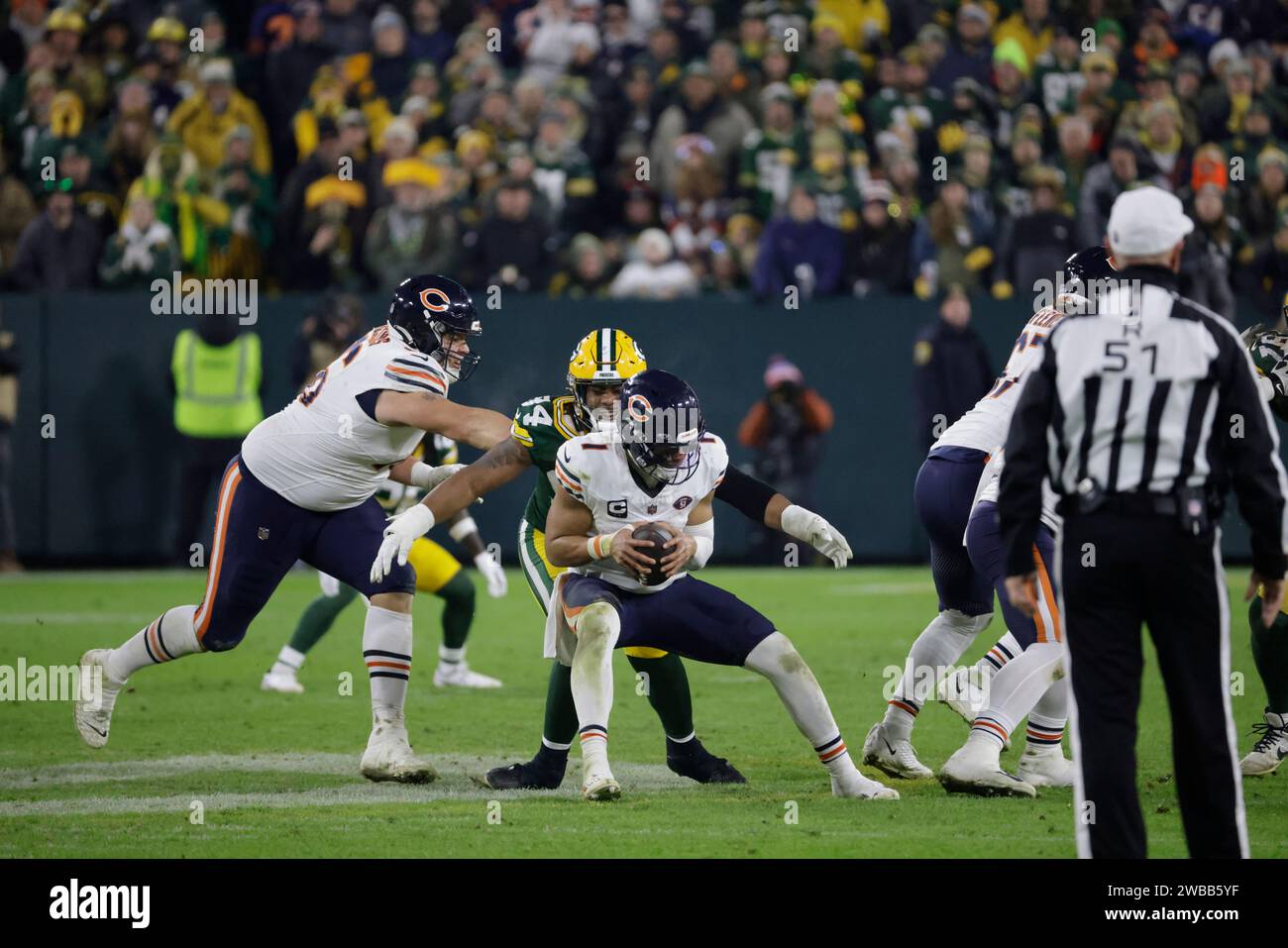 Chicago Bears quarterback Justin Fields (1) gets sacked by Green Bay ...