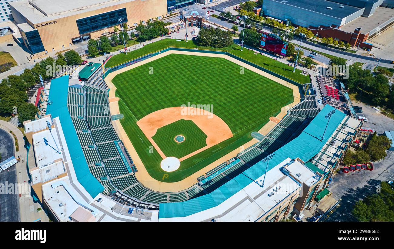 Aerial View of Urban Baseball Stadium with Vibrant Field and Cityscape ...