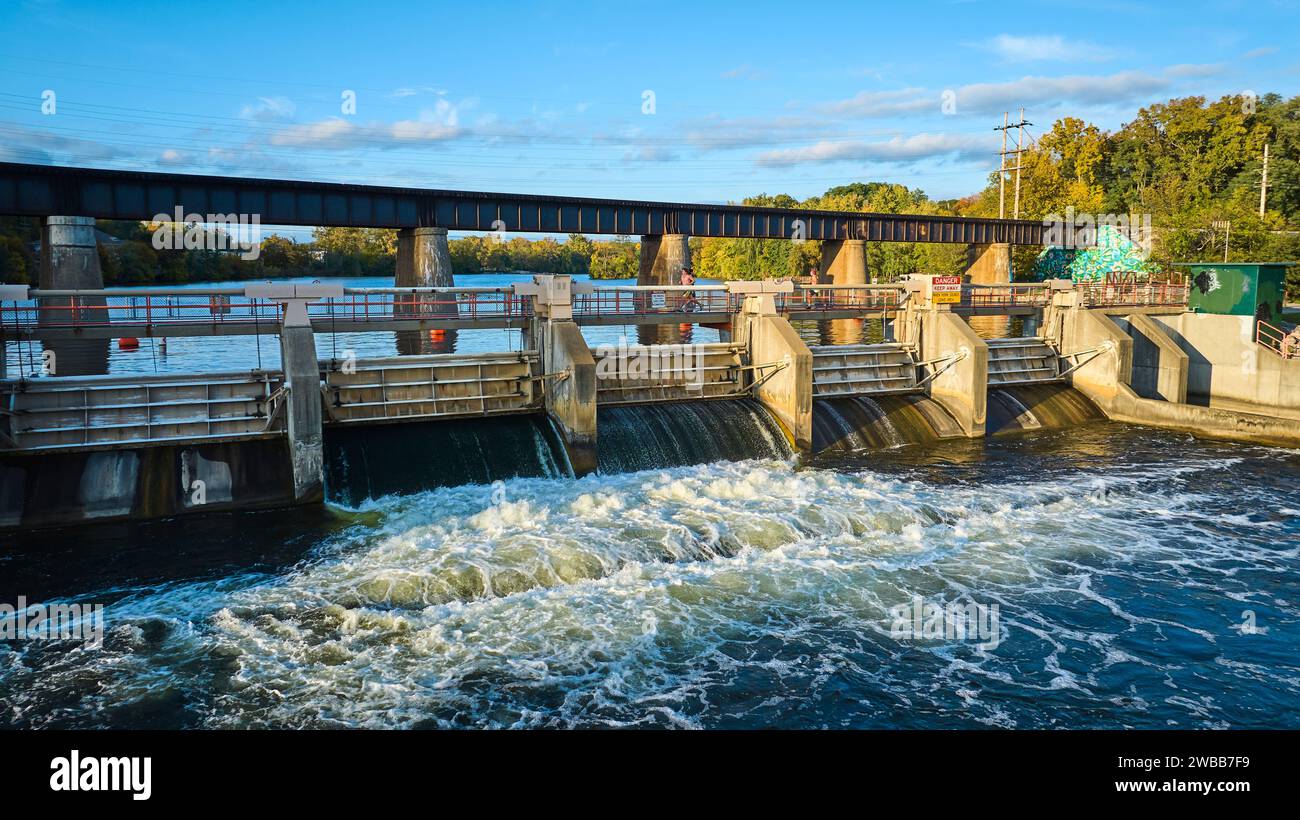 Aerial View of Argo Dam and Railway Bridge at Golden Hour Stock Photo ...