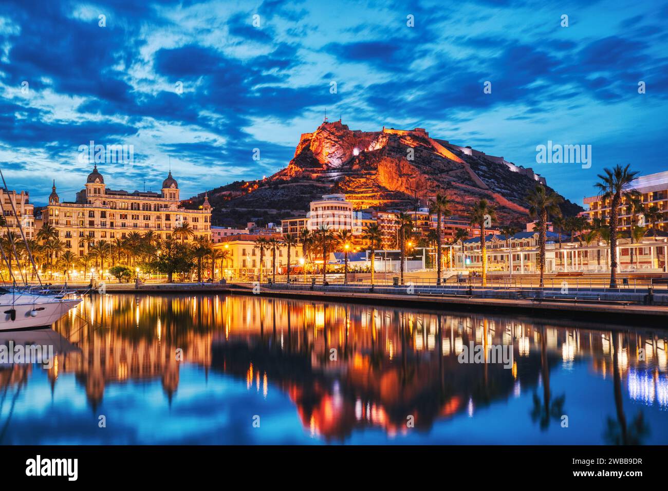 Illuminated Alicante Old Town Panorama at Dusk with Santa Barbara ...