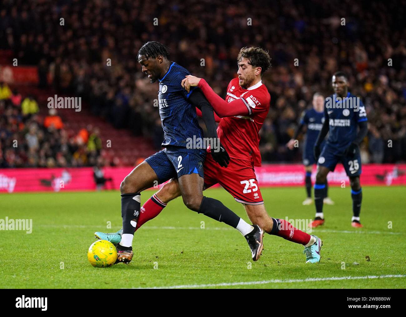 Chelsea's Axel Disasi (left) and Middlesbrough's Matt Crooks battle for ...