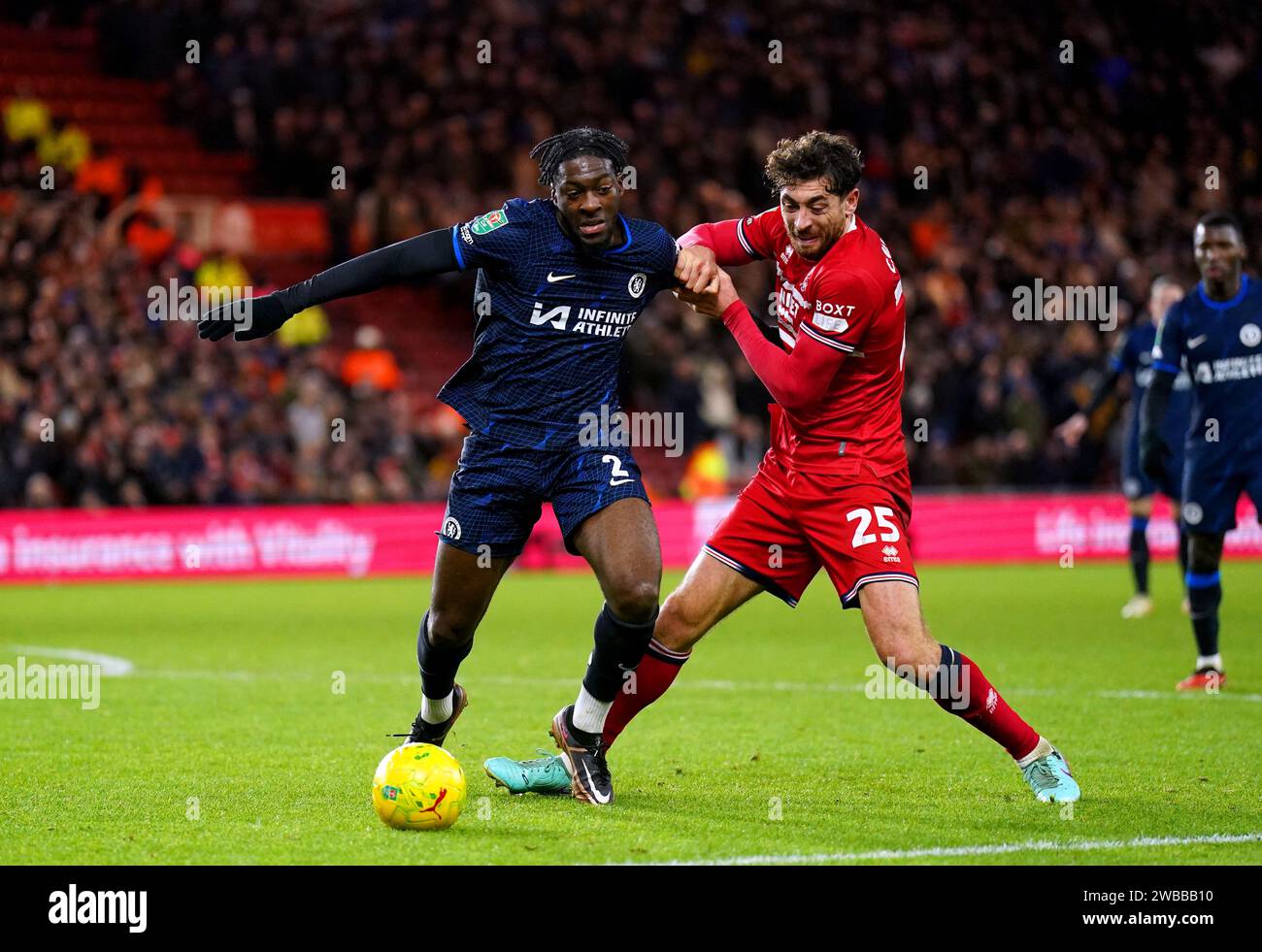 Chelsea's Axel Disasi (left) and Middlesbrough's Matt Crooks battle for ...