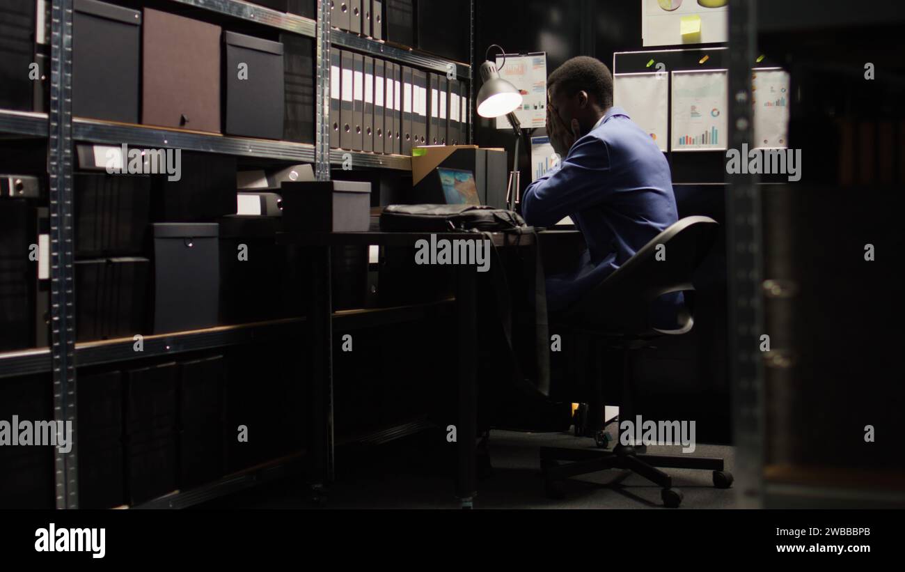 African american policeman looking laptop hi-res stock photography and ...