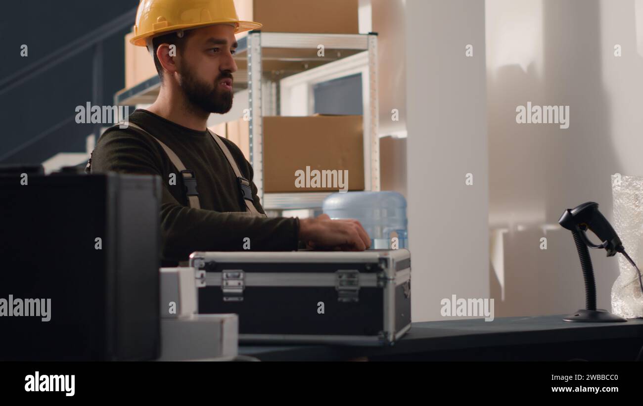 Repository warehouse team leader carrying out the logistics of ...