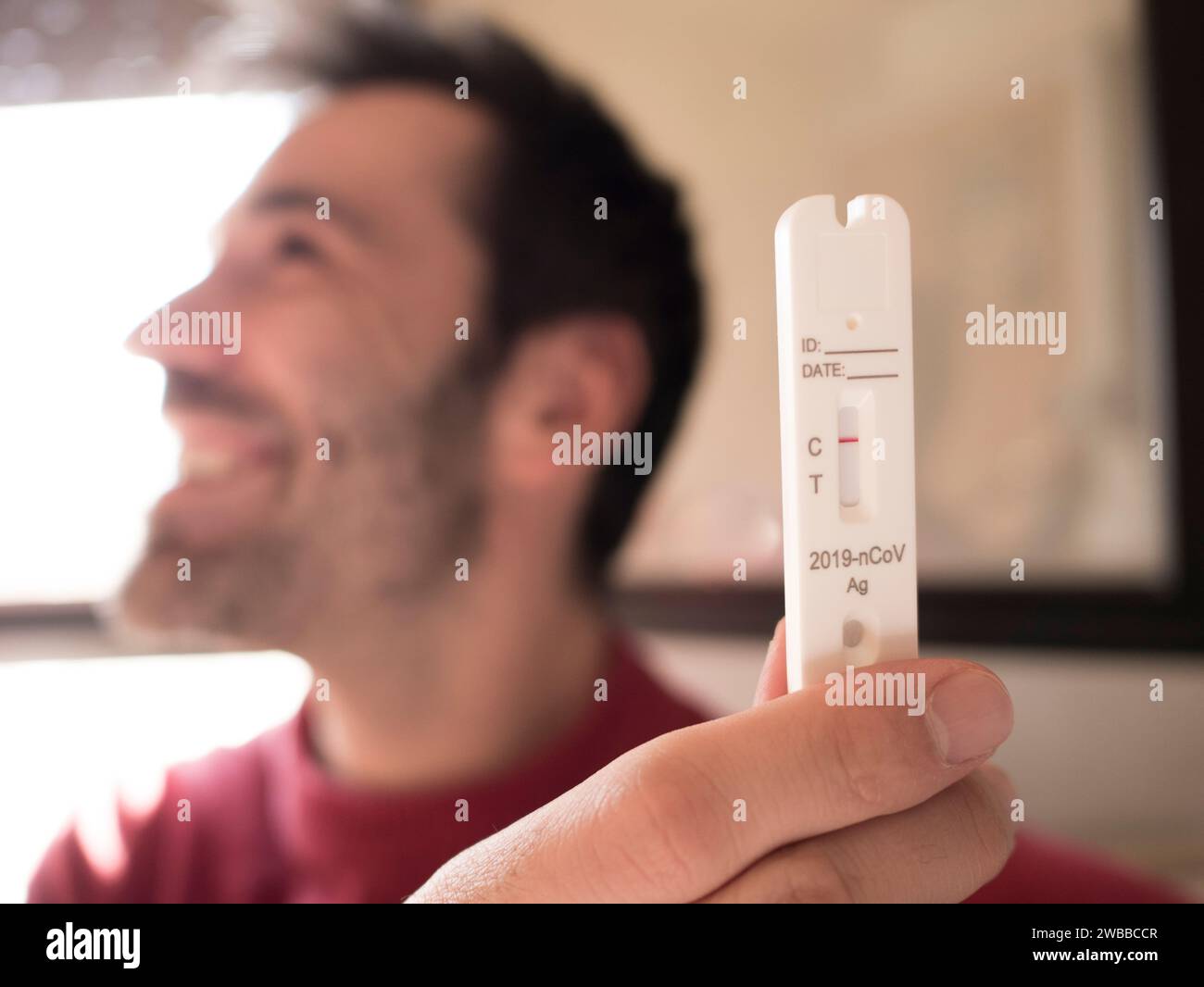 Optimistic scene: A man with black hair and beard displays a negative ...