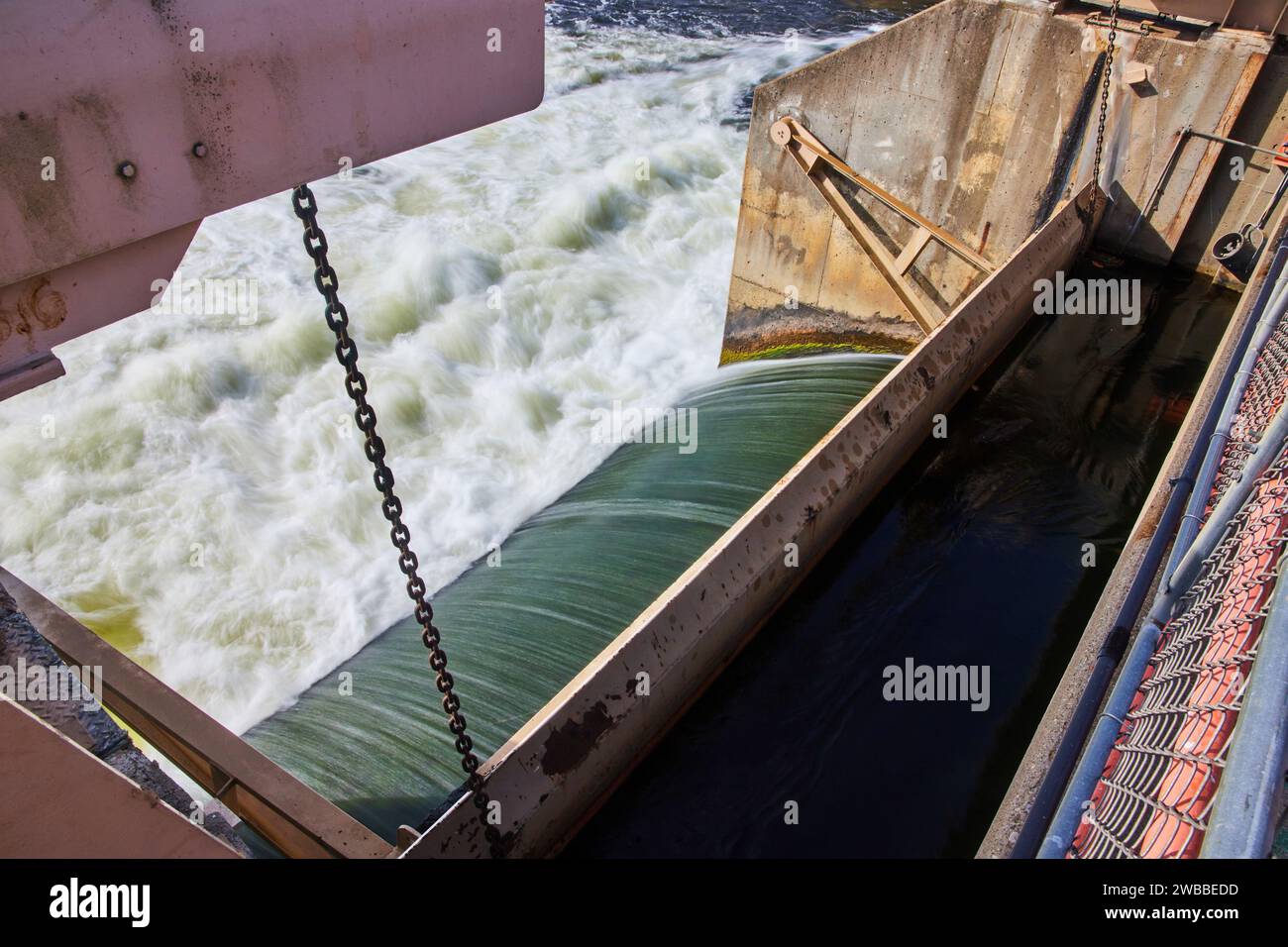 Powerful Water Flow at Argo Dam Spillway, Side Perspective Stock Photo ...