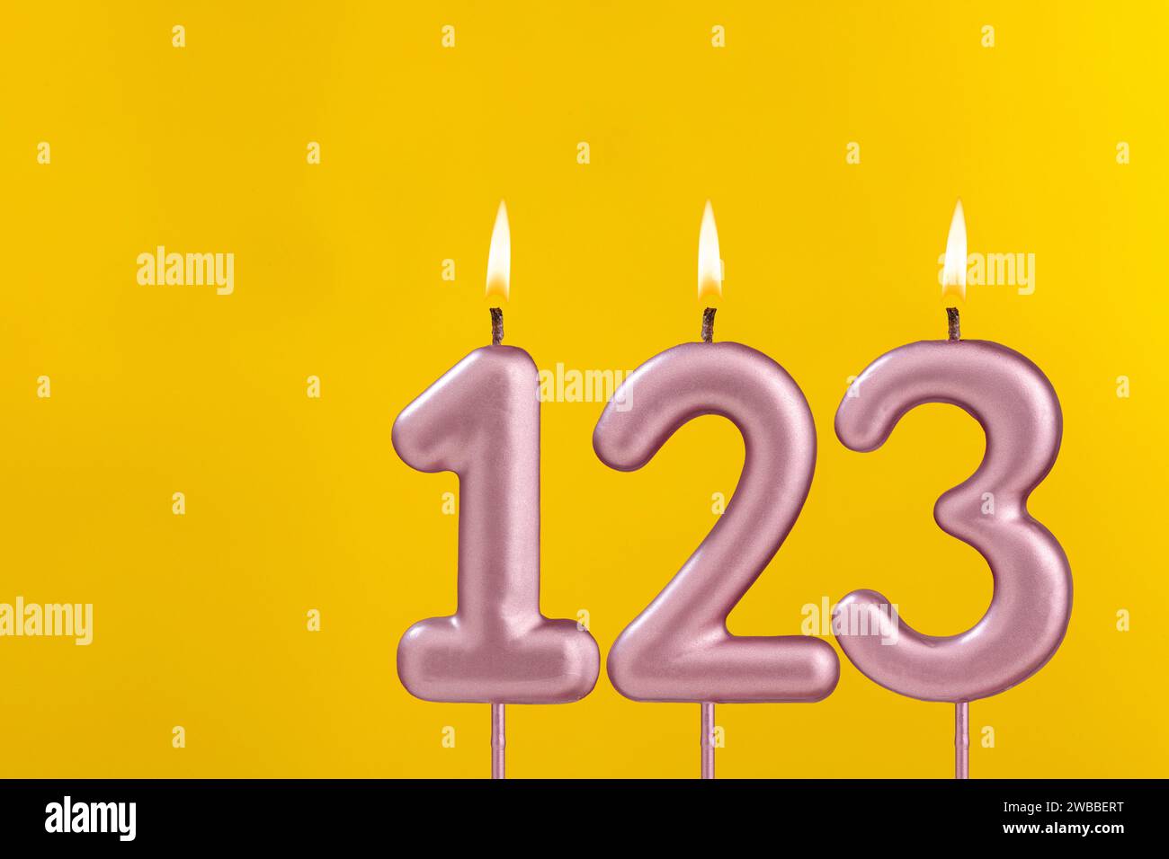 Birthday candle number 123 - Birthday celebration on yellow background ...