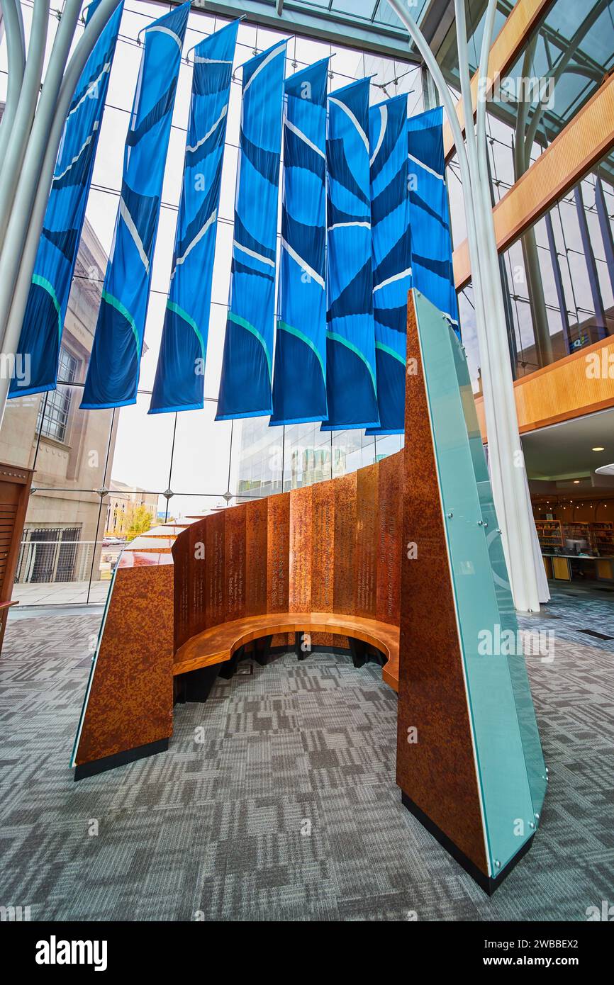 Modern Library Interior with Blue Banners and Curved Bench Stock Photo ...