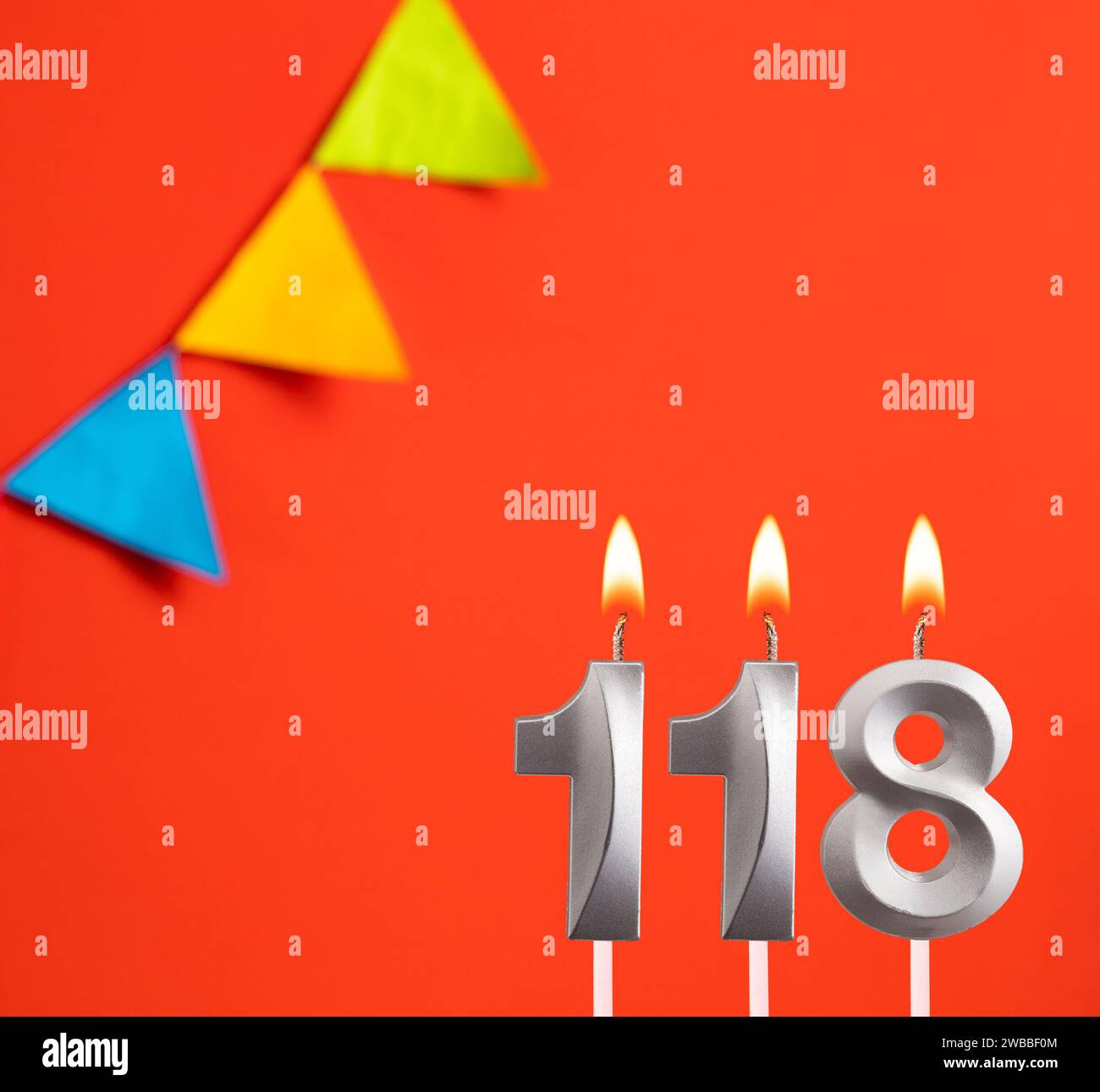 Birthday card - Number 118 candle in orange background Stock Photo - Alamy