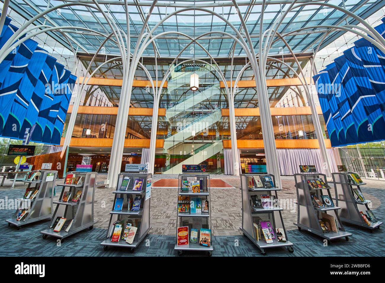 Modern Library Interior with Colorful Book Stands and Natural Light ...