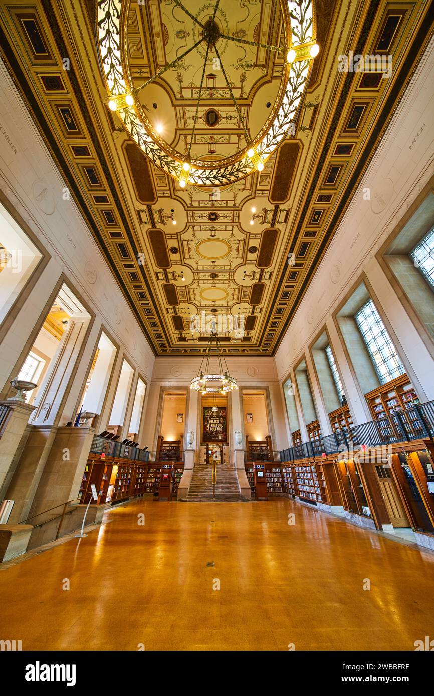 Grand Library Interior with Ornate Ceiling and Central Staircase Stock Photo - Alamy